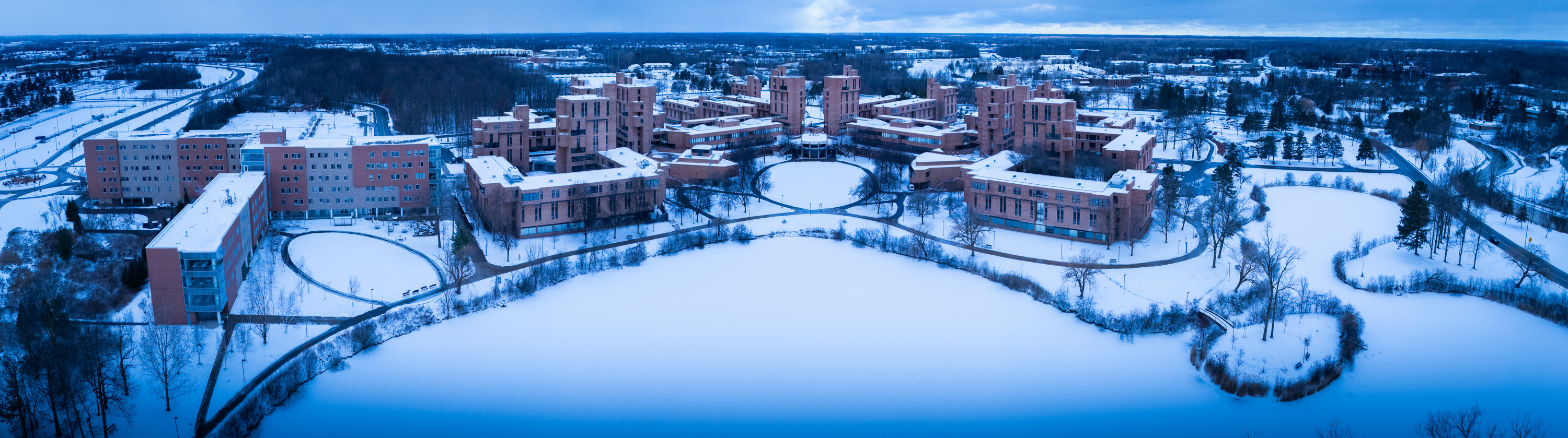 A collection of buildings used for student housing at a university with ...