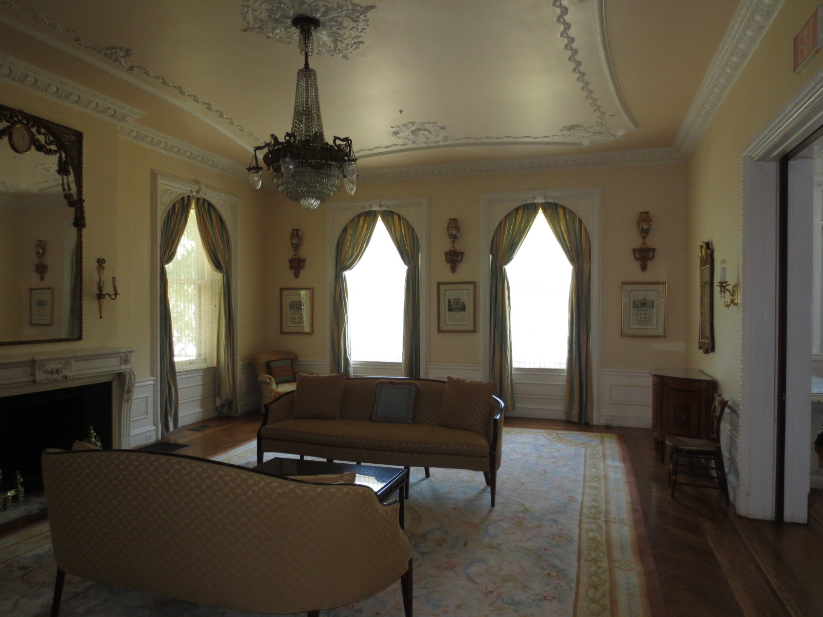 a sitting room, with early 1900s furniture, inside the Scott House