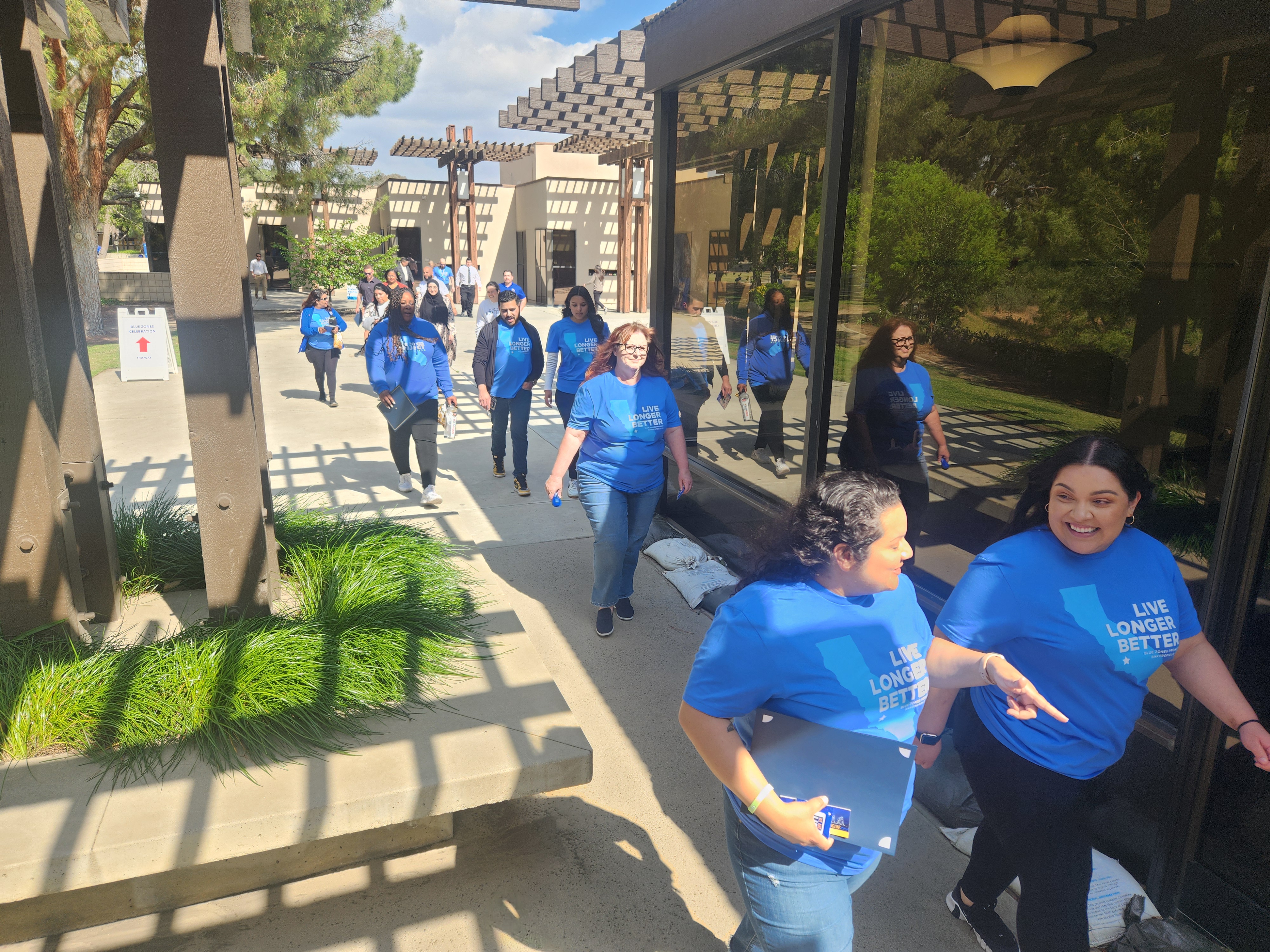 Attendees of Thursday's ceremony take a walk on one of the new `Runner ...