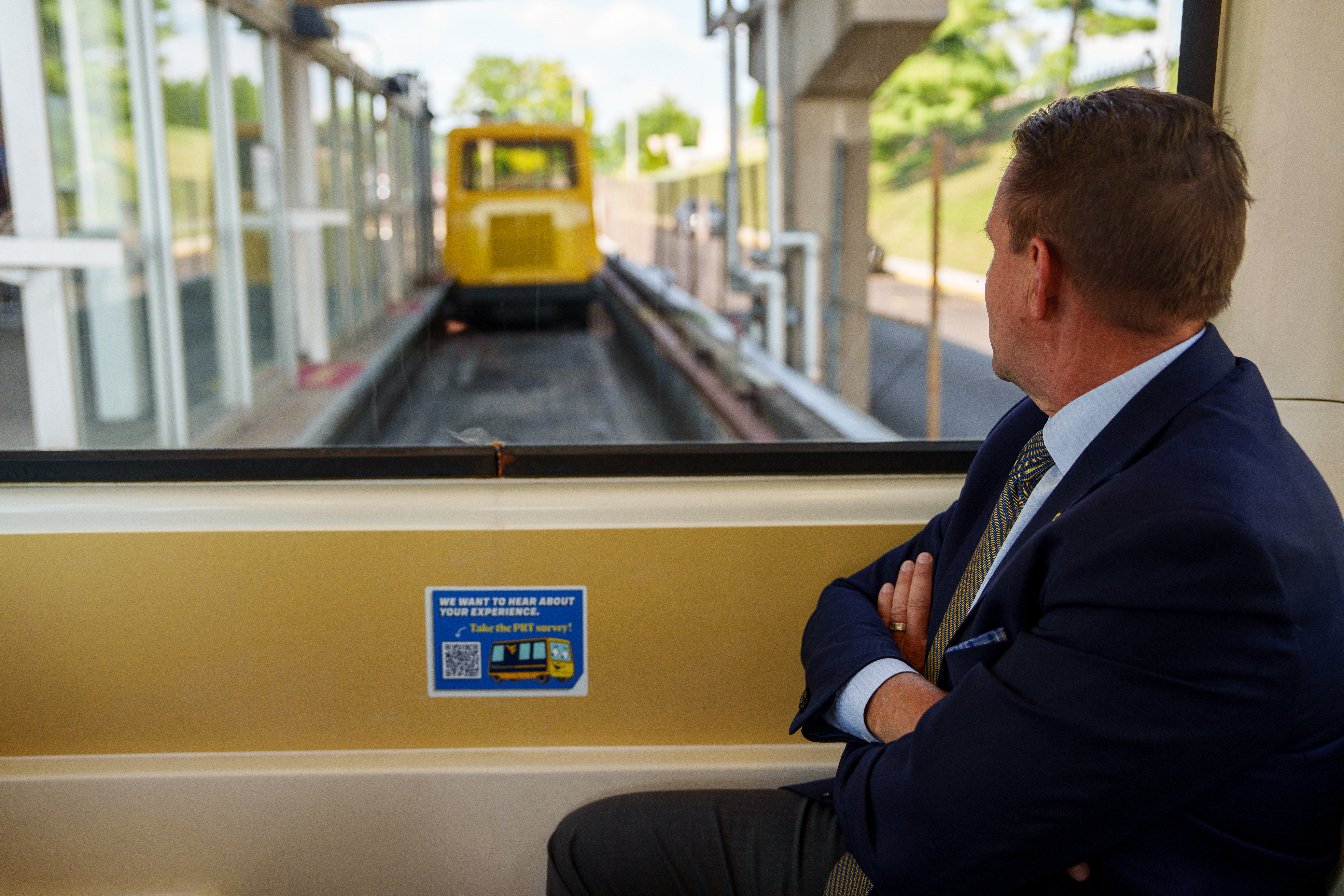 WVU President Michael T. Benson takes a ride on the PRT in his first ...
