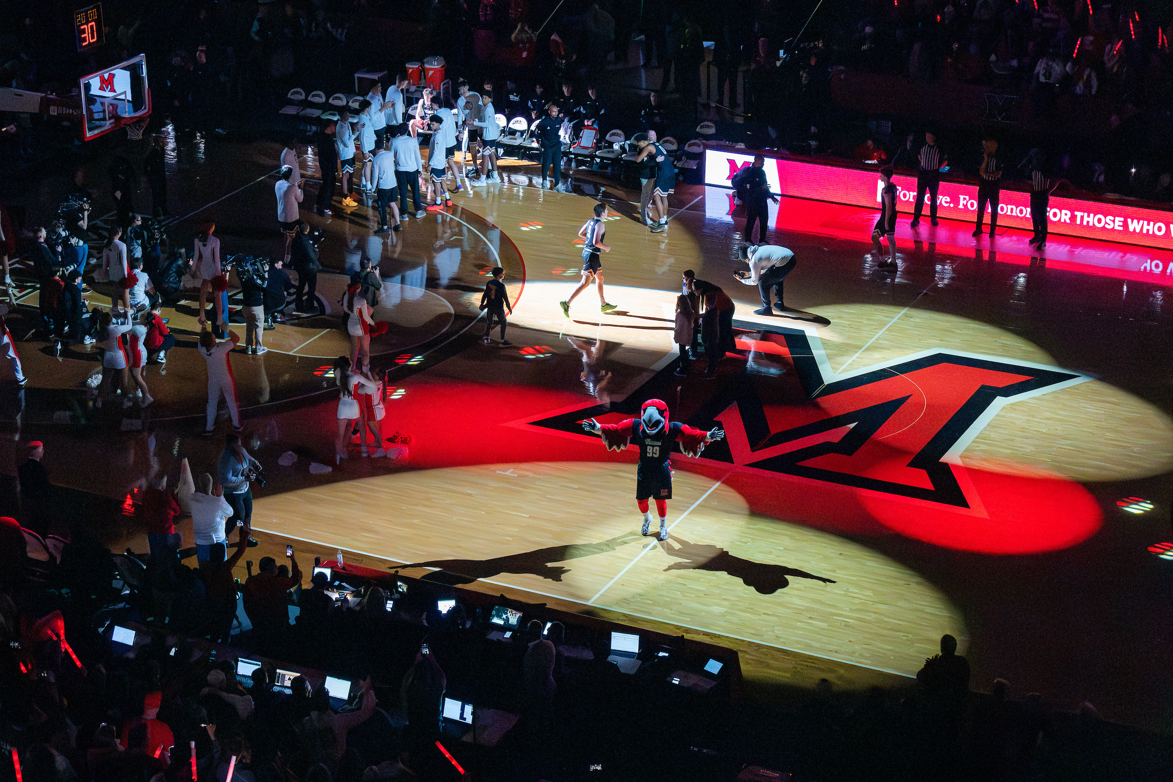 Miami Day event shows the Miami RedHawks mascot standing center court ...