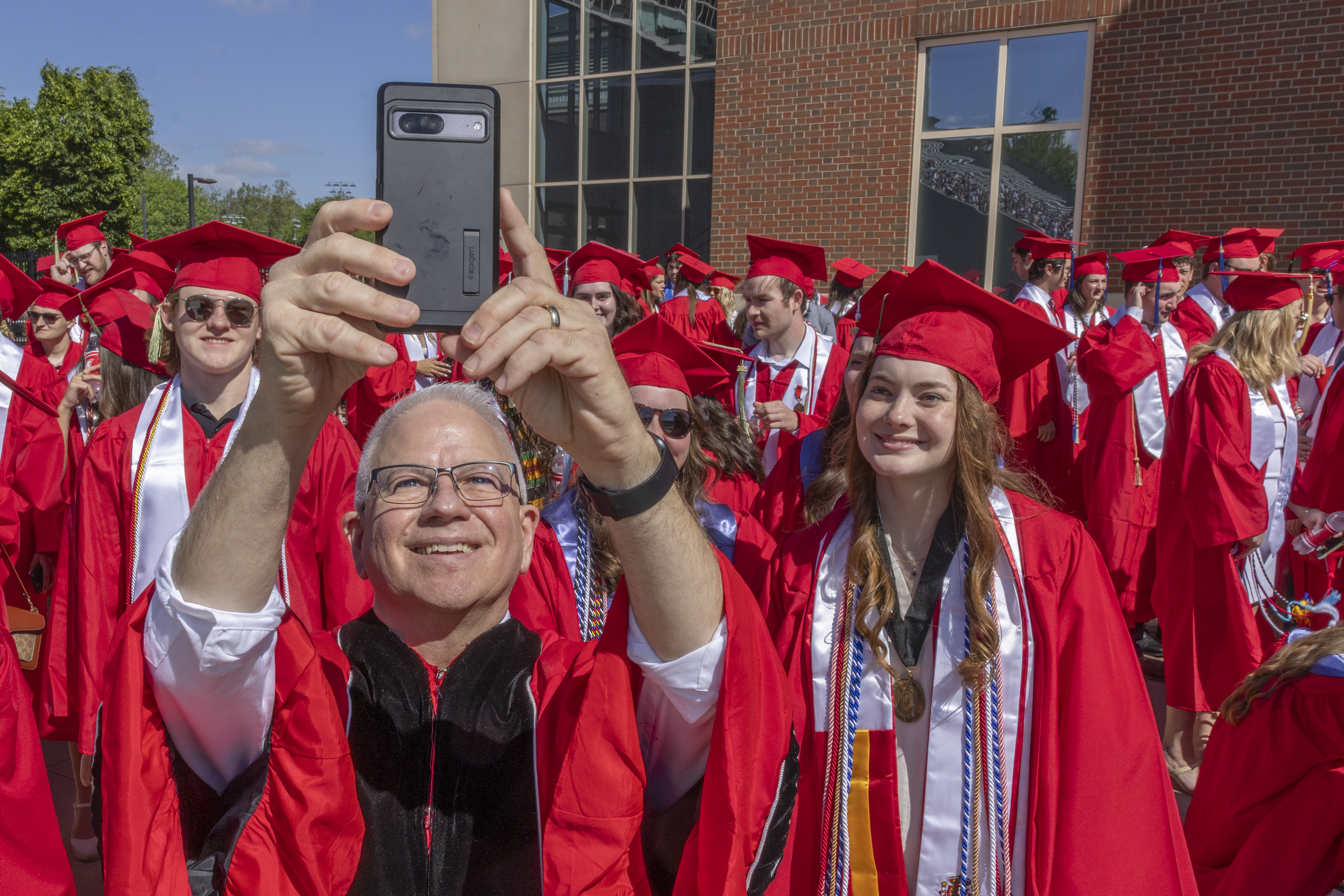 Miami University students prepare for spring commencement on May 17 at ...