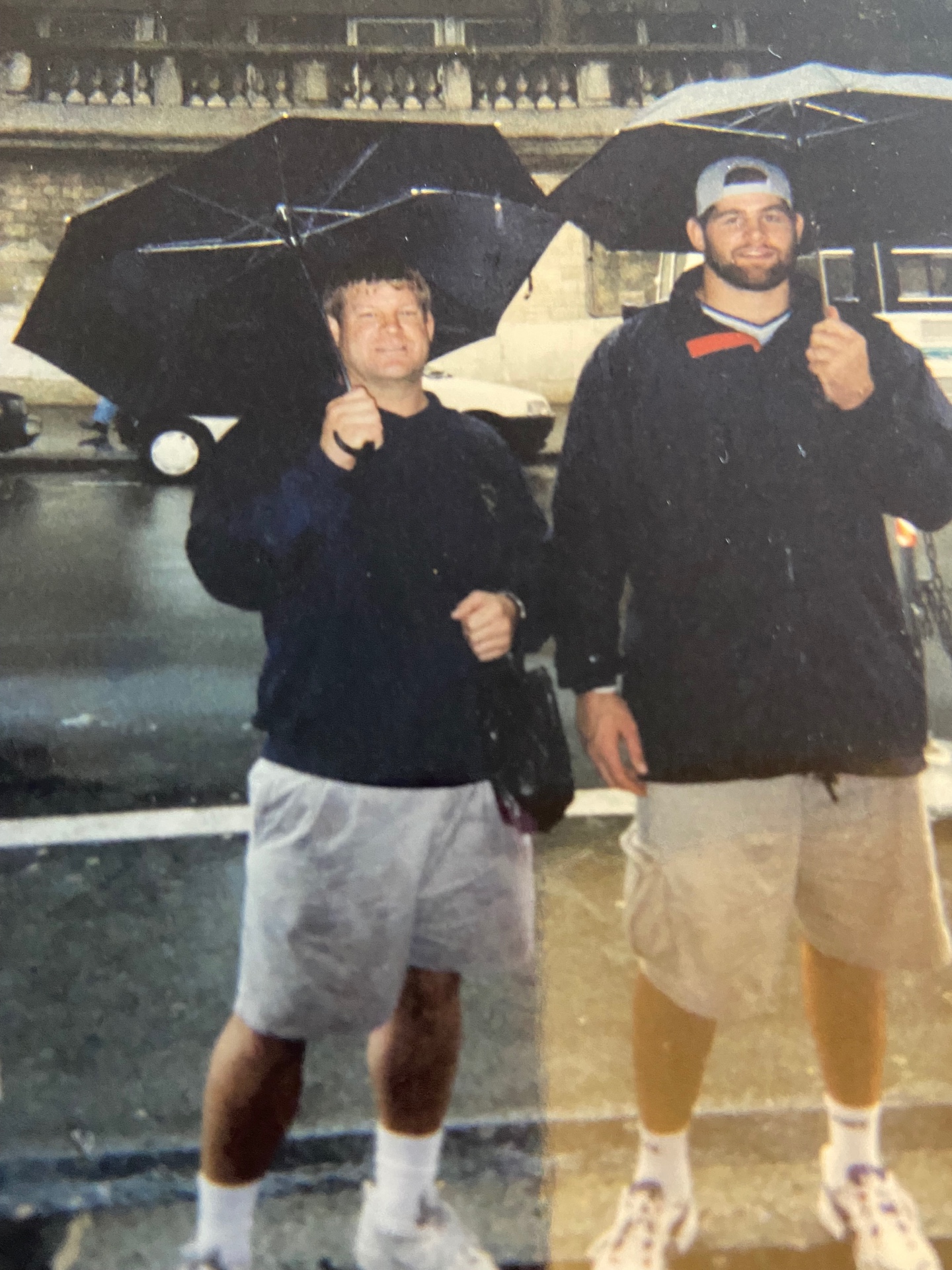 Pope, left, and Neal on a rainy day in Paris training for the 1999 ...