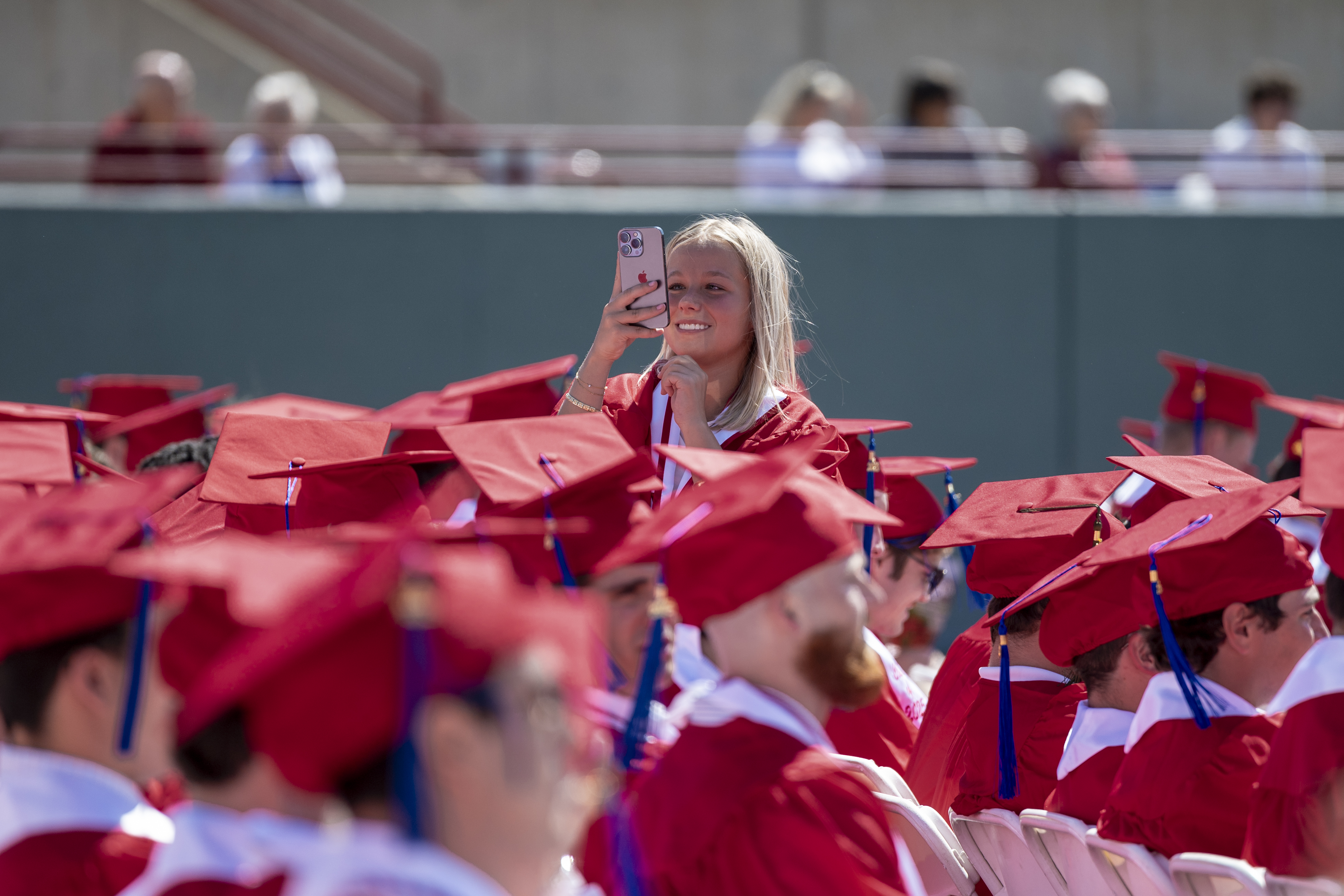 A Miami University student snaps a photo during the 186th spring ...