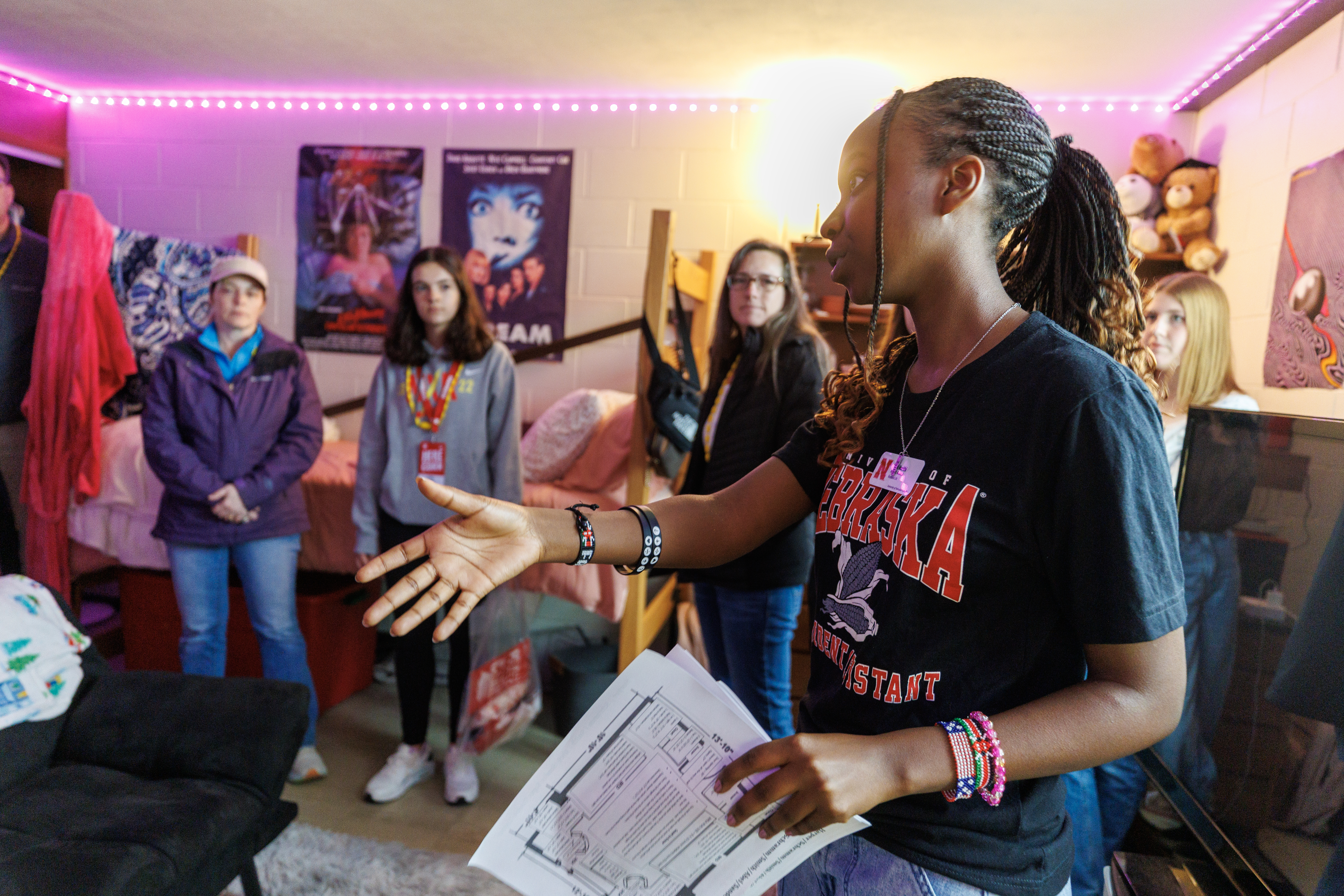 Admitted students and parents tour through a residential hall during ...