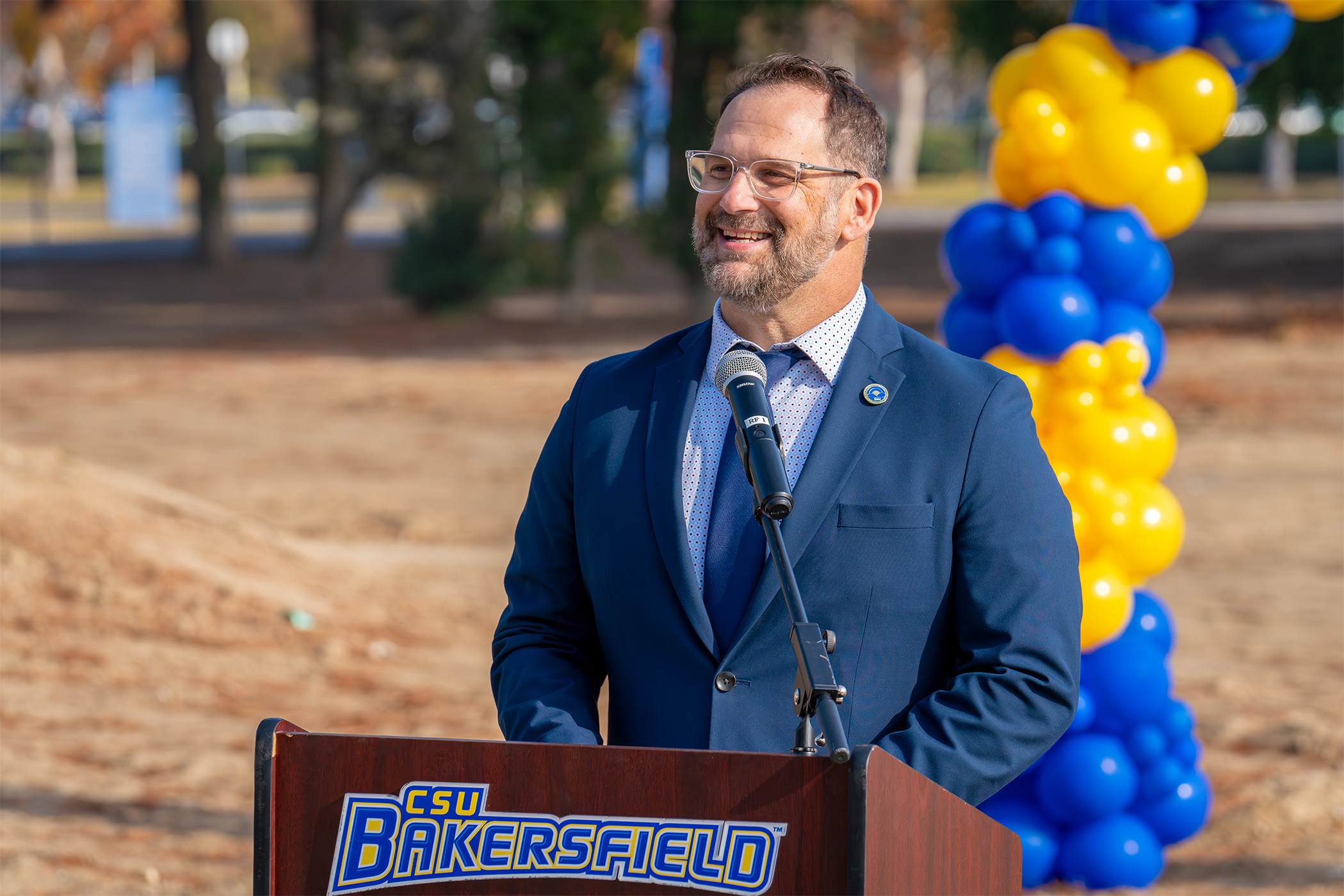 Basic Needs Director Dr. Jason Watkins speaks at Tuesday's ...