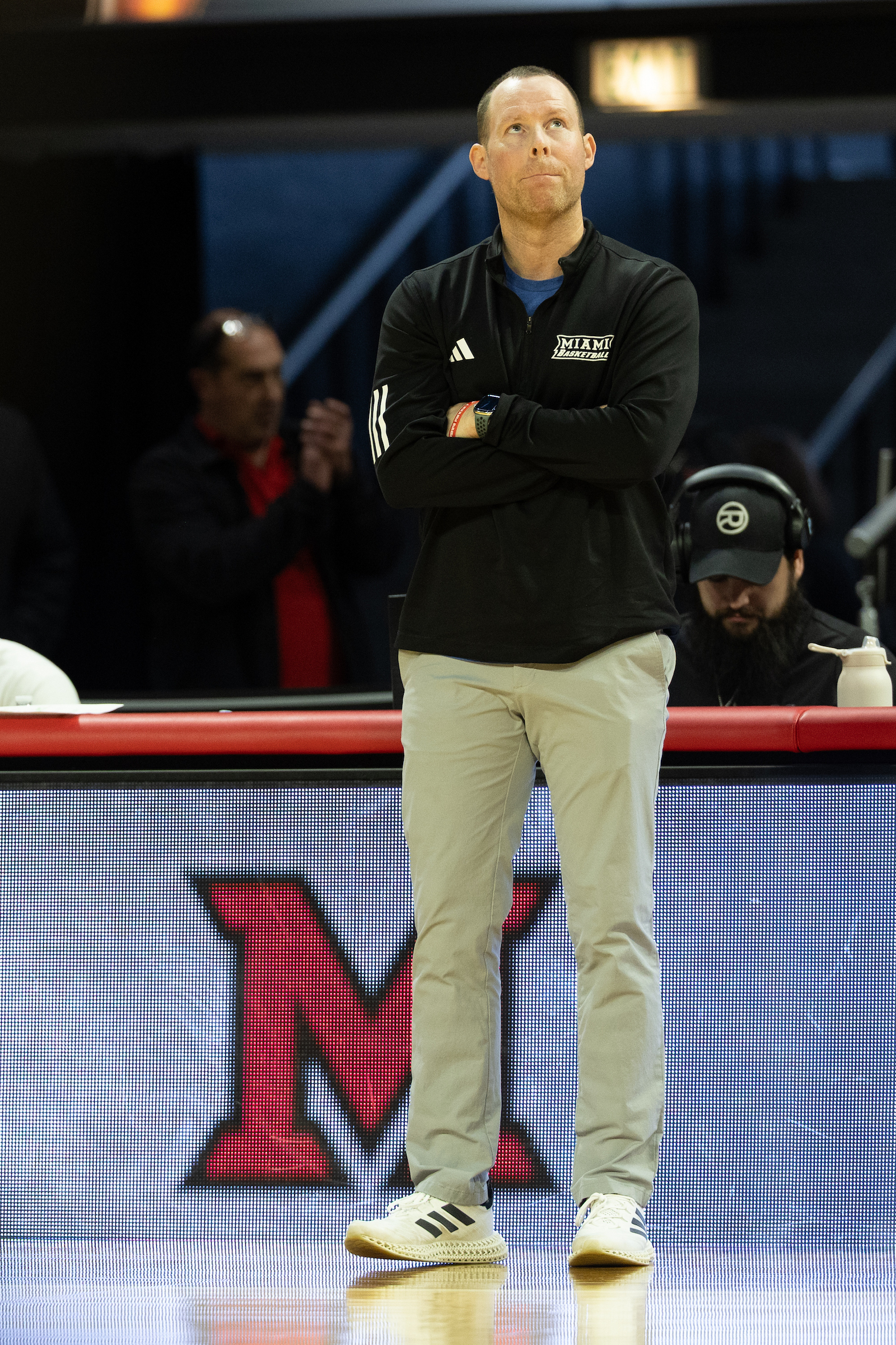 Travis Steele looks at the scoreboard during Saturday's game at Millett ...
