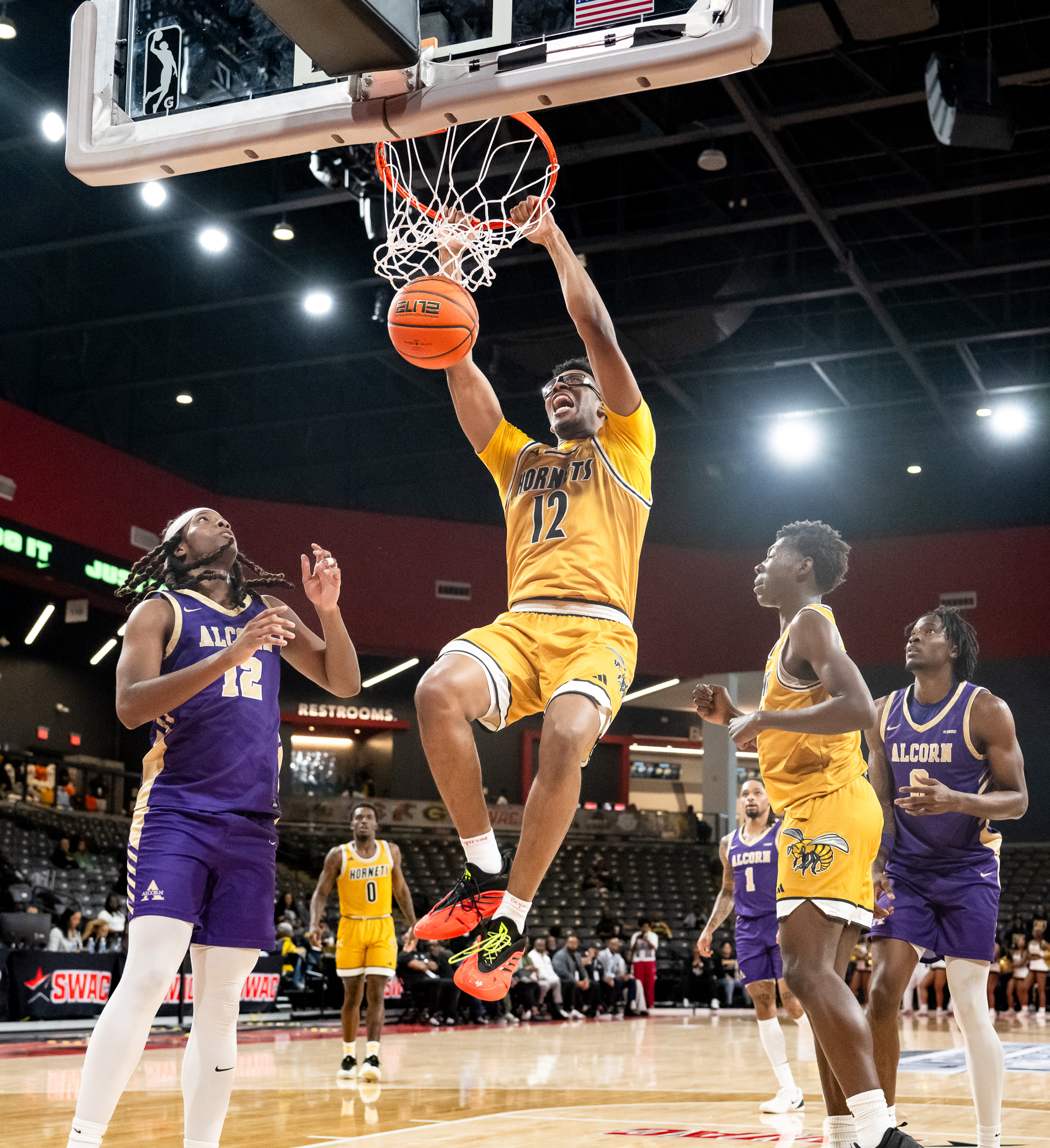Alabama State University's Tyler Mason dunks as the Hornets face Alcorn ...