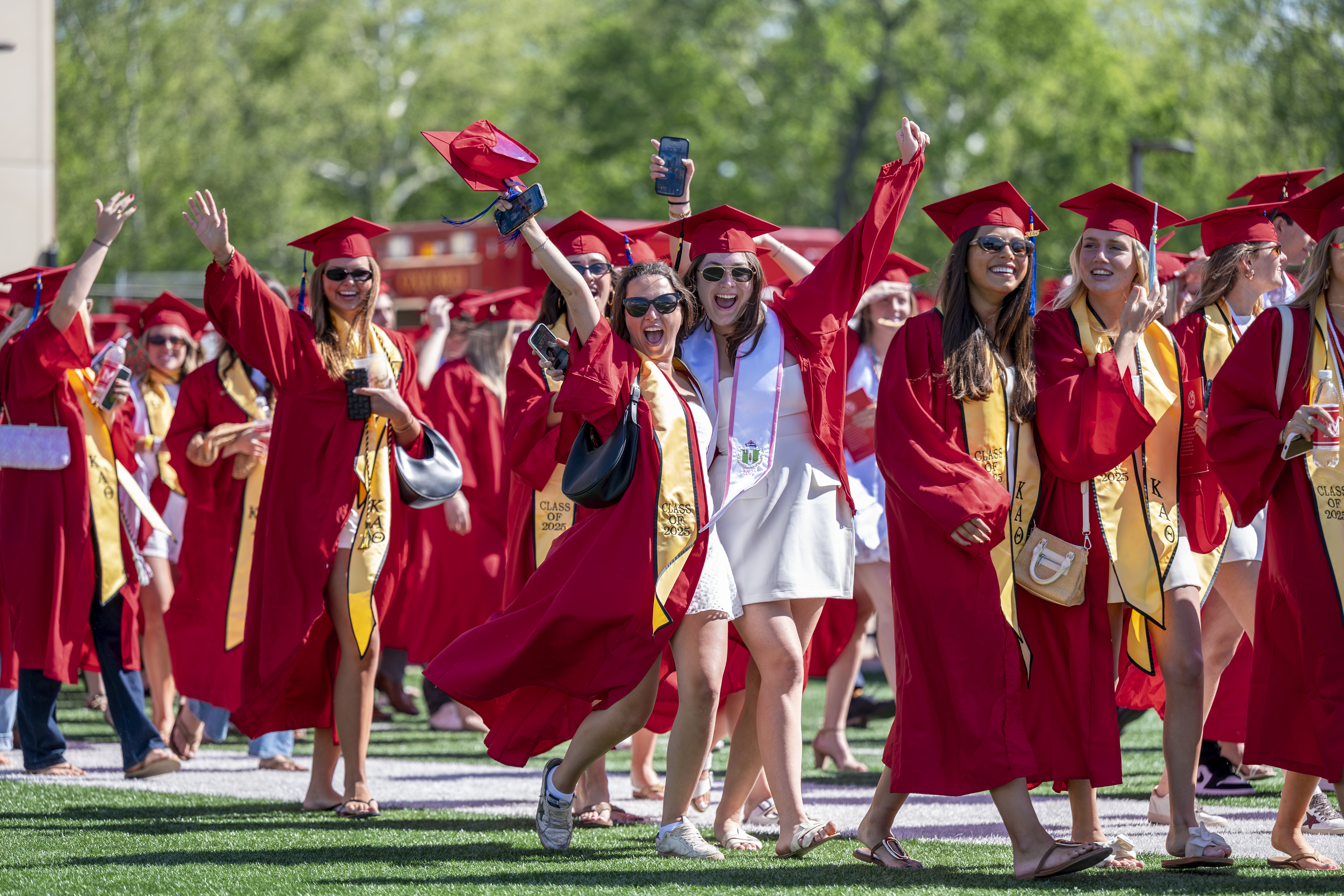 Miami University students wave to the crowd at Yager Stadium.