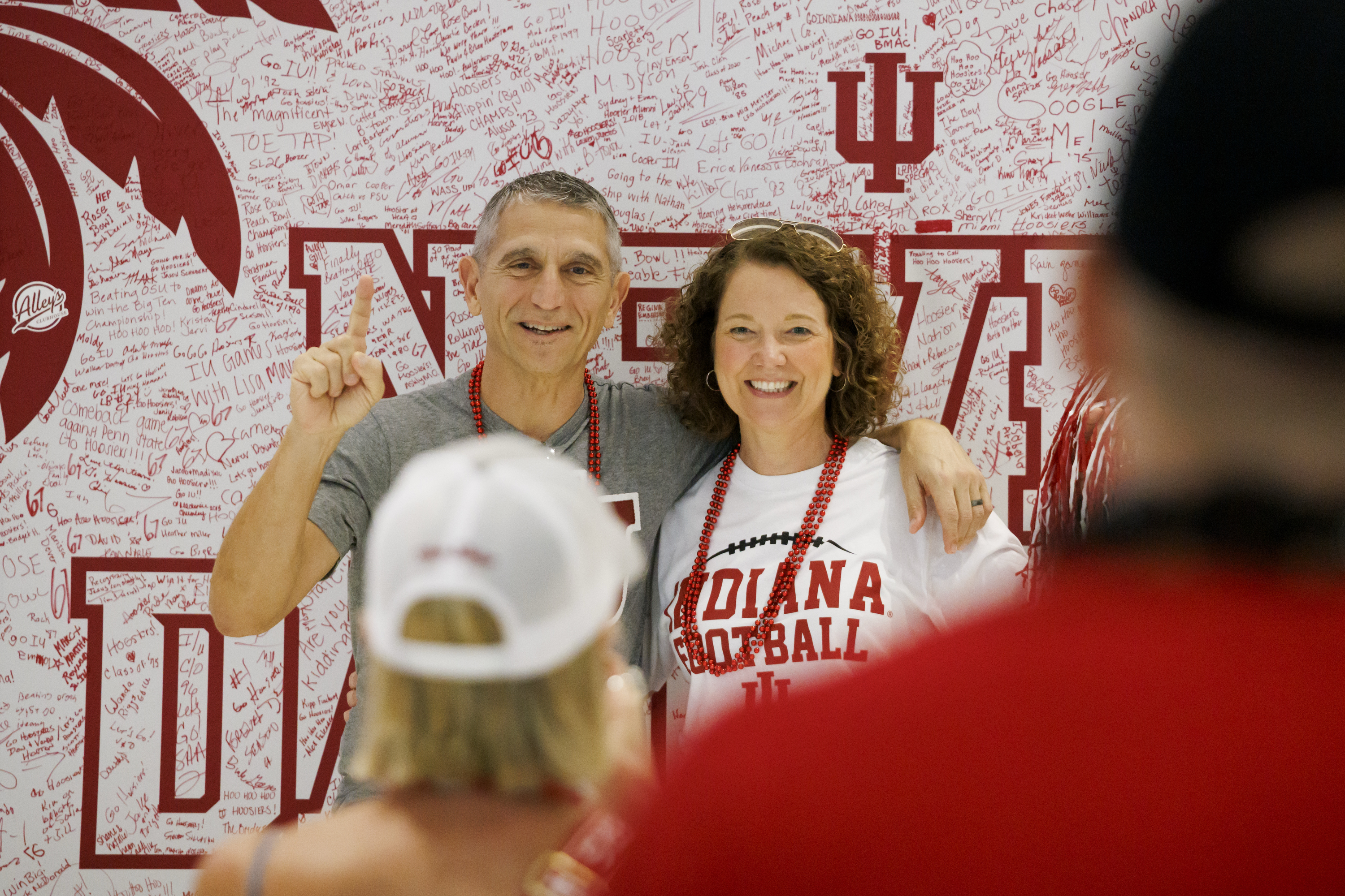 IU fans pose for a photo at Playoff Fan Central in the Miami Beach ...