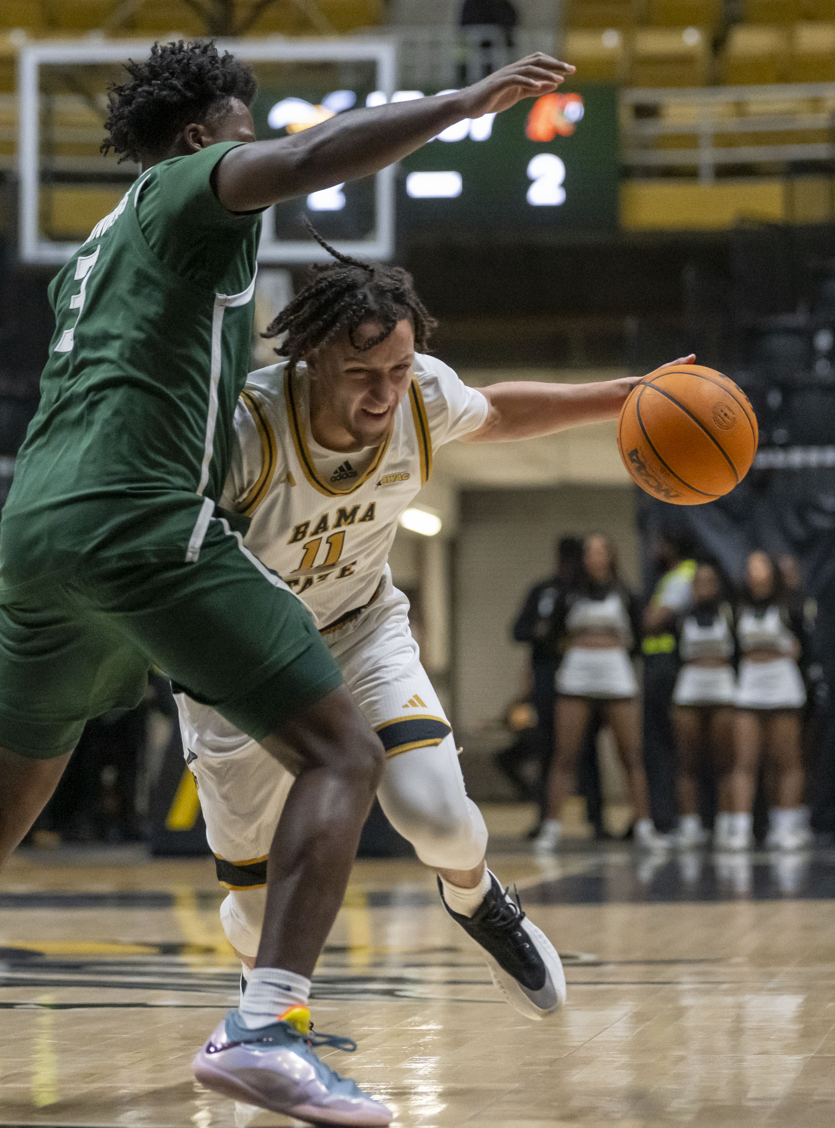 Alabama State University's Cameron Palesse drives downcourt as ASU ...