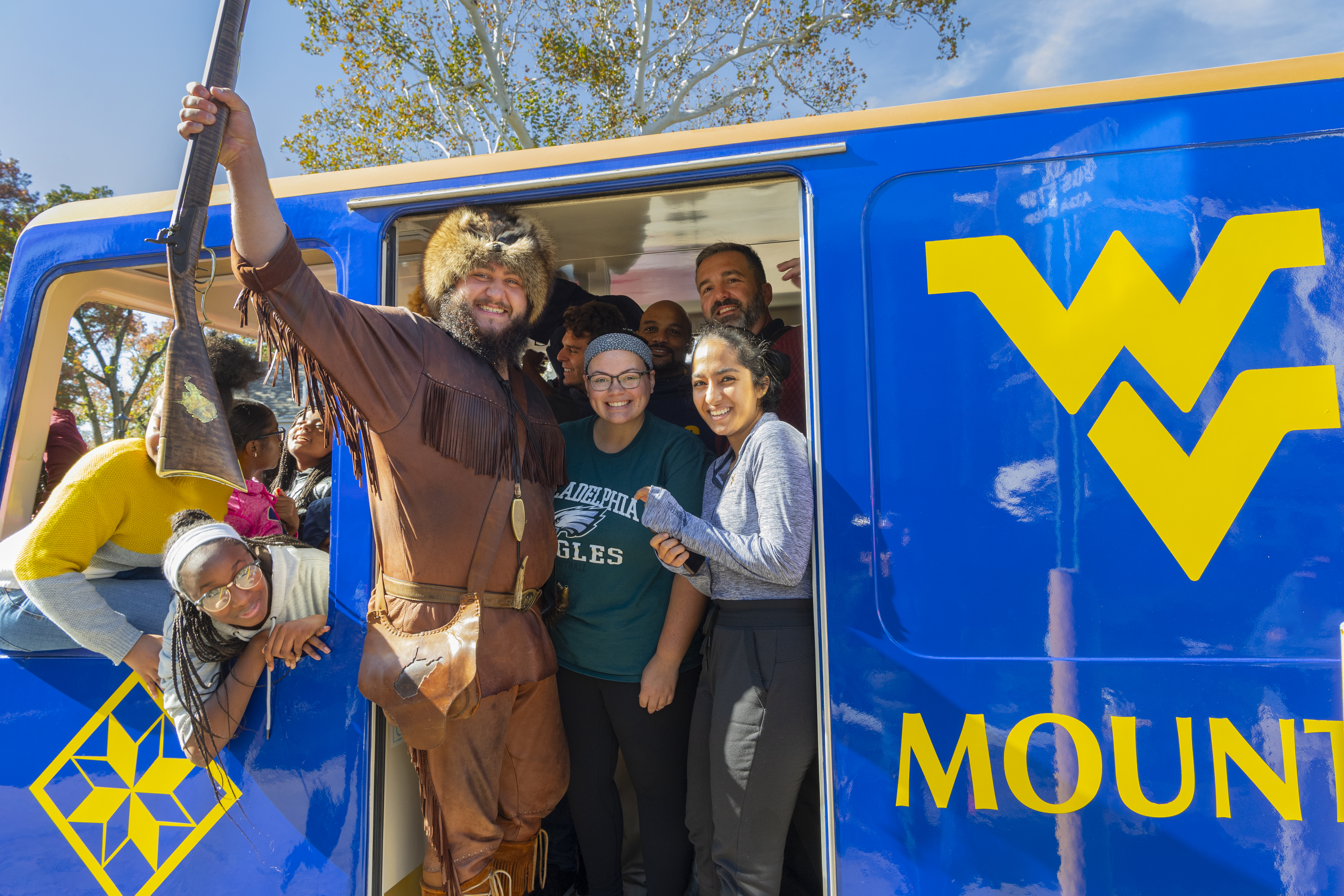 Timothy Eads, Mountaineer mascot for 2019-2020, helped a group of WVU ...